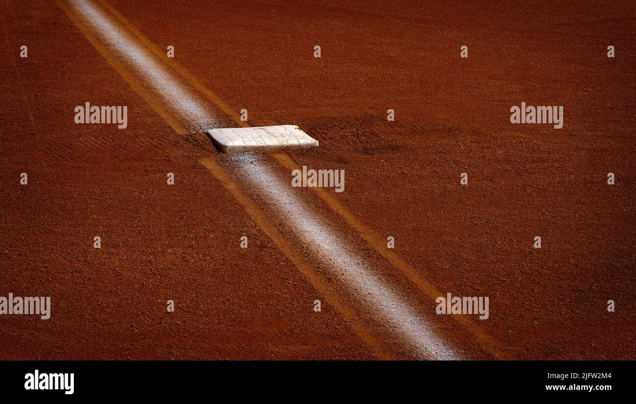 Baseball base and chalked base line in diamond Stock Photo - Alamy