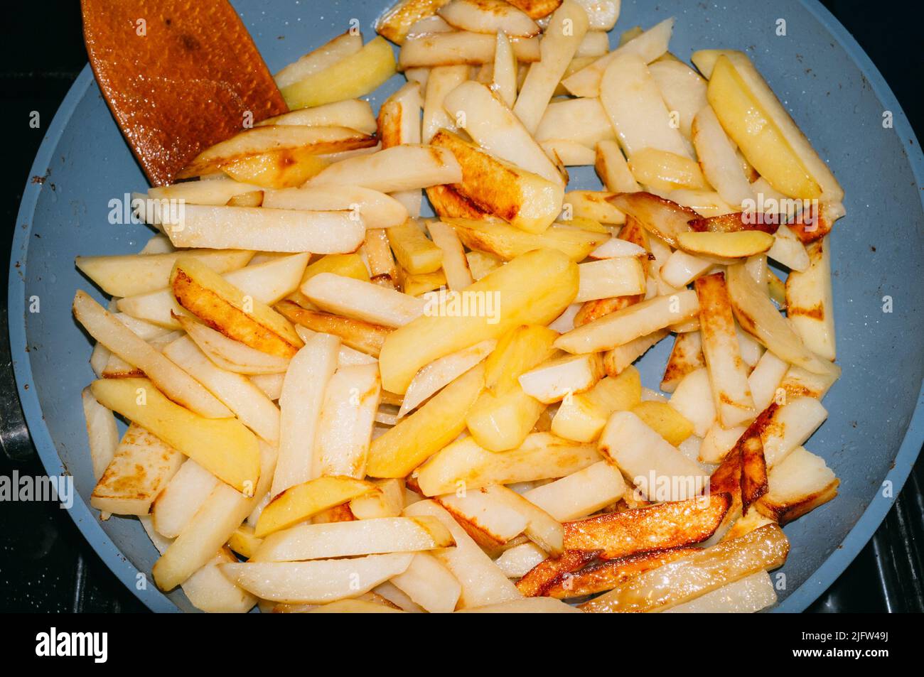 French fries cooking at home Stock Photo - Alamy