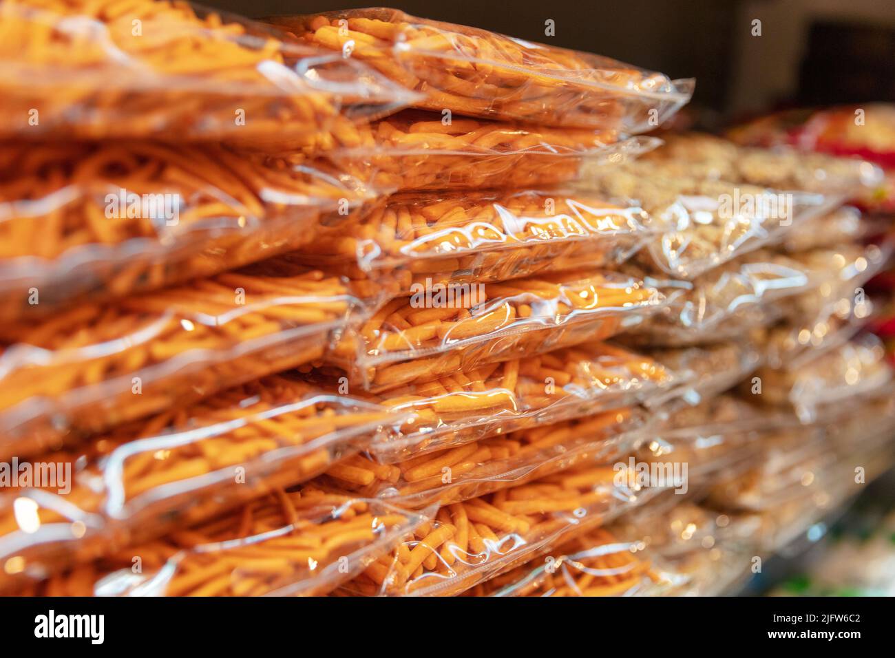 Fresh Snacks In Plastic Displayed At Shop Stock Photo - Alamy