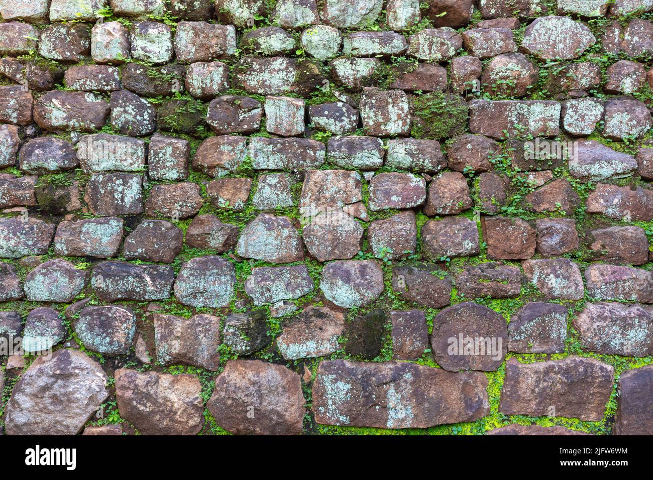 Attractive vintage stone wall background, texture in natural color ...