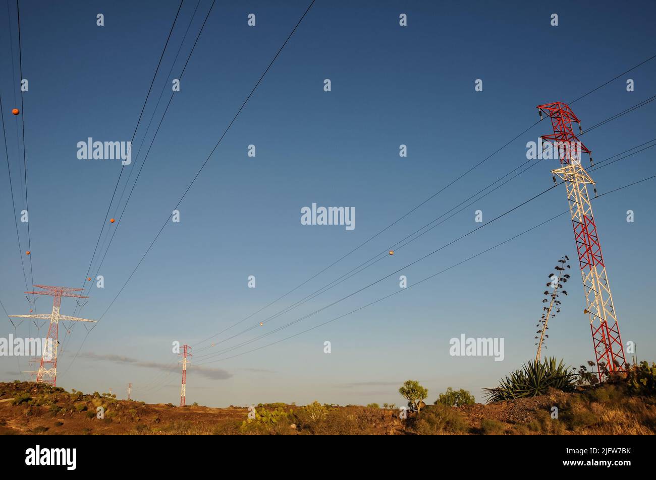 Energy Electricity Power Pylon on a Blue Sky Stock Photo - Alamy