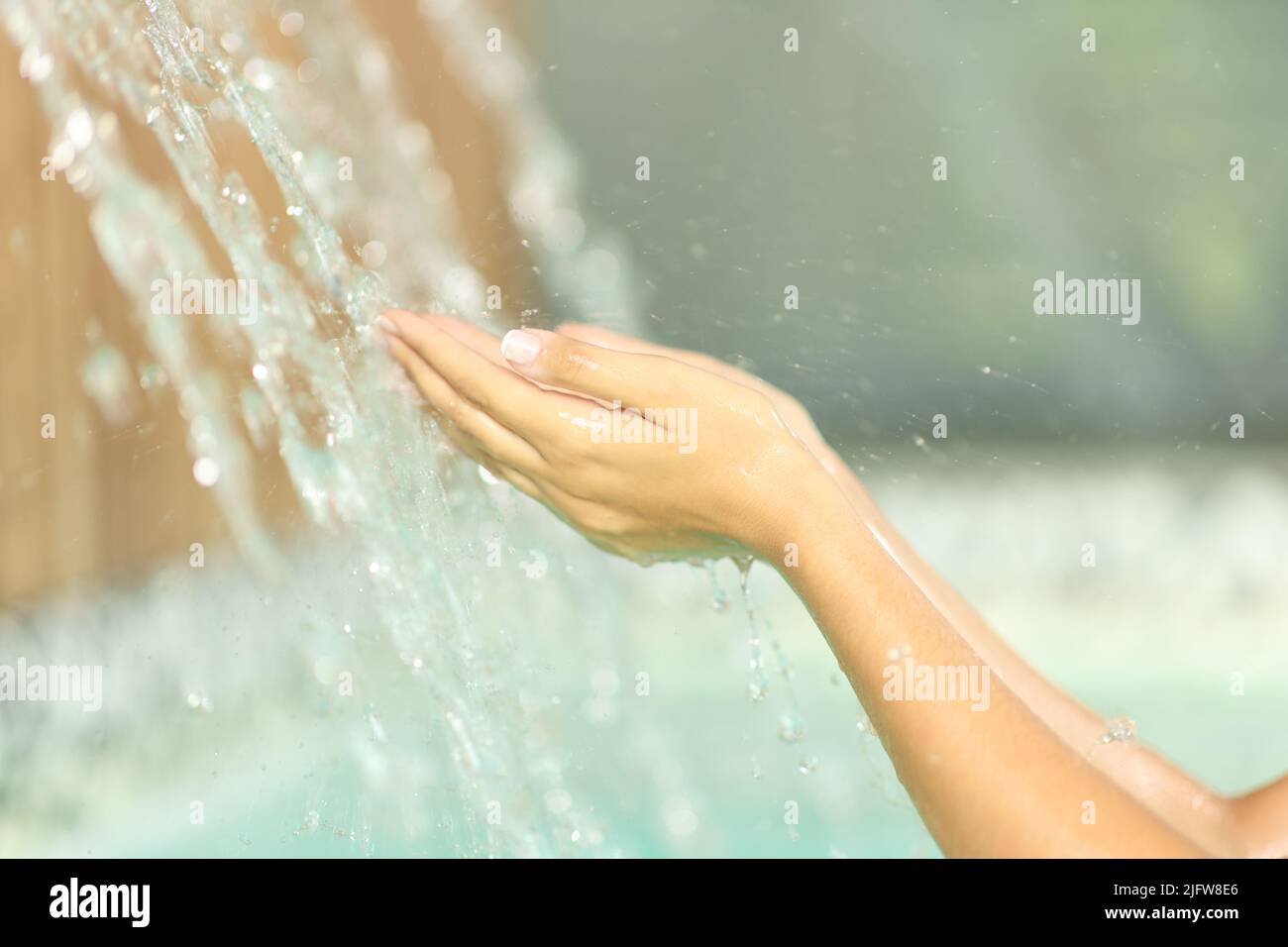 Hand in water catching water hi-res stock photography and images - Alamy