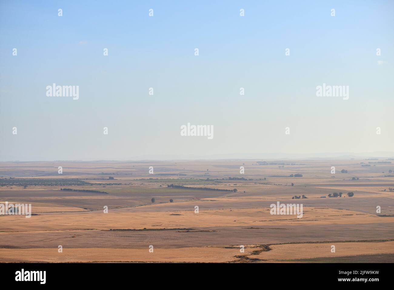 Aerial view of dry brown farm land after harvest in Western Cape, South ...