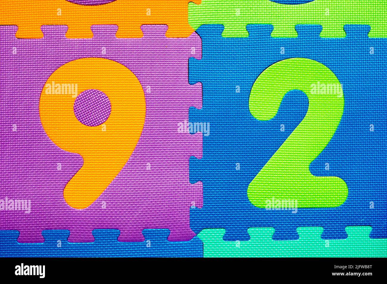 Colourful number foam puzzle mat for children. Number nine and two ...