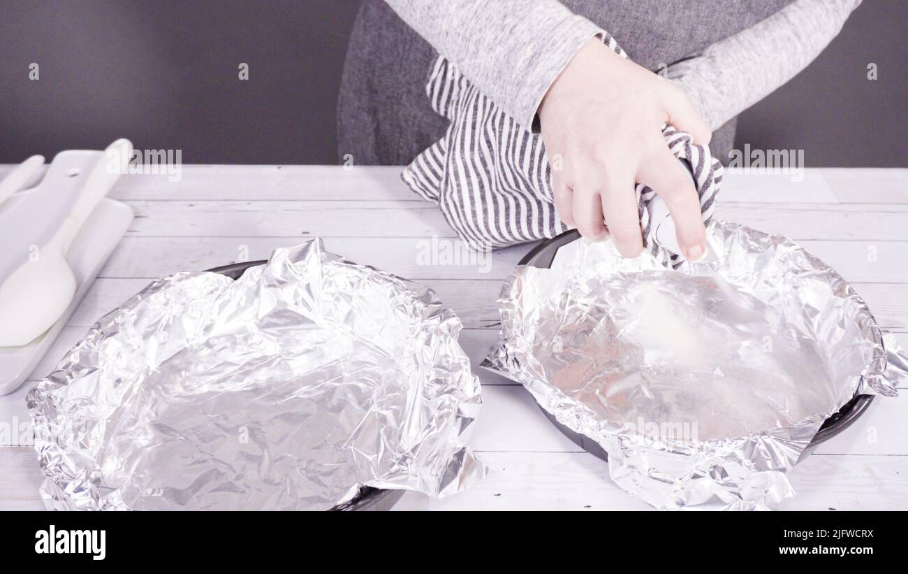 Step by step. Greasing baking pan to make homemade fudge Stock Photo ...