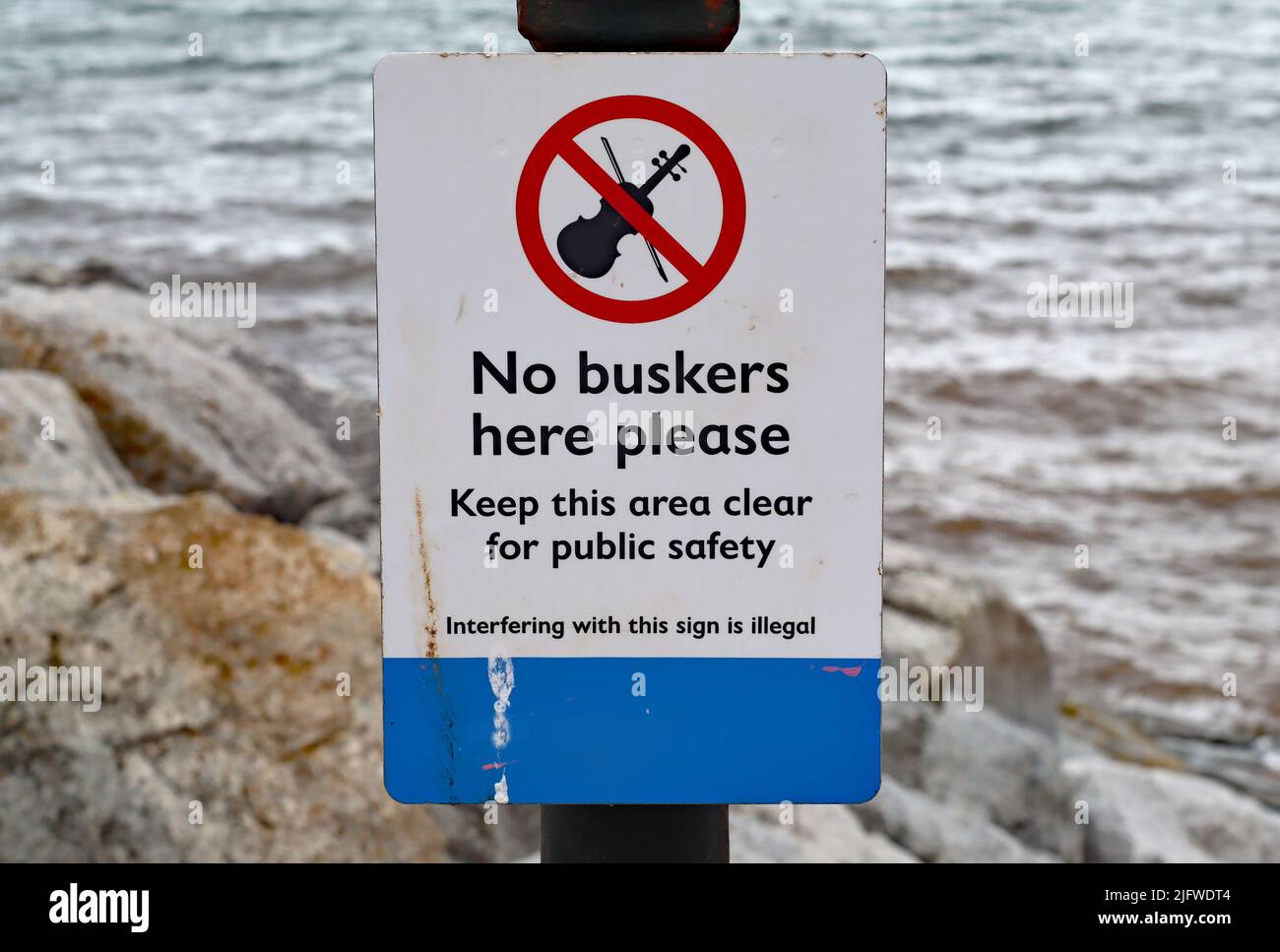 Busking prohibited notice hi-res stock photography and images - Alamy