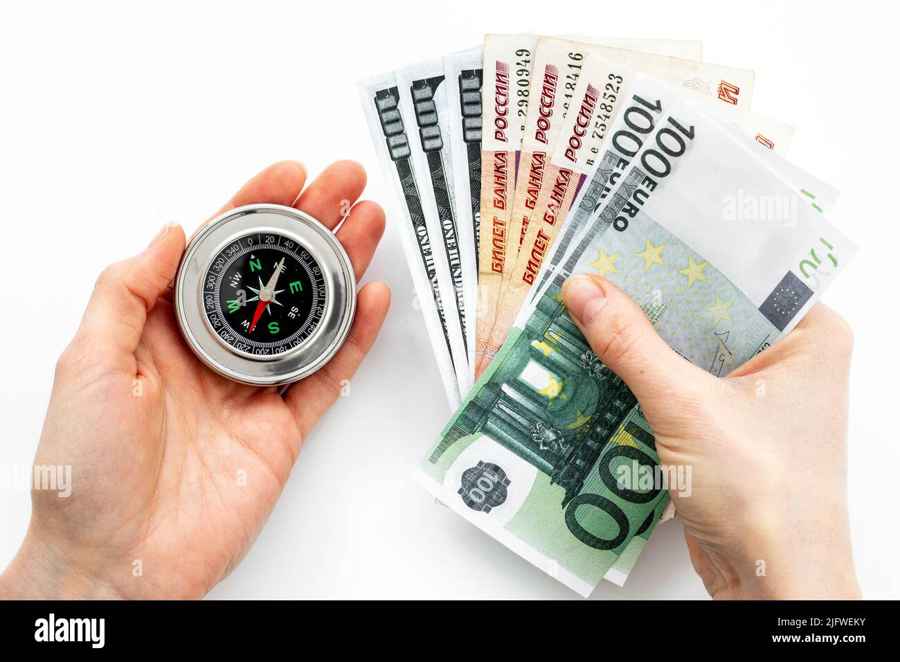 Compass and money cash. Exchange quotes of currencies concept Stock ...