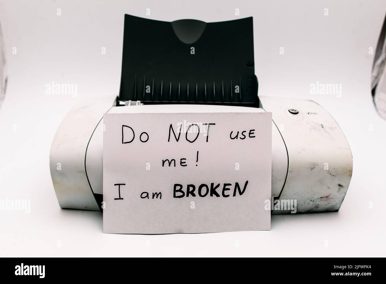 Broken printer equipment repair dirty white Stock Photo - Alamy