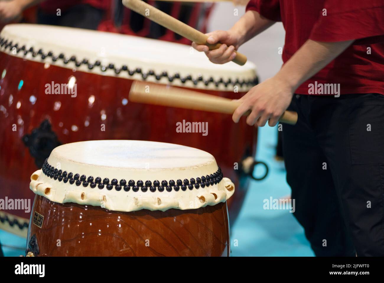 Musicians Performing on Taiko Drums Stock Photo - Alamy