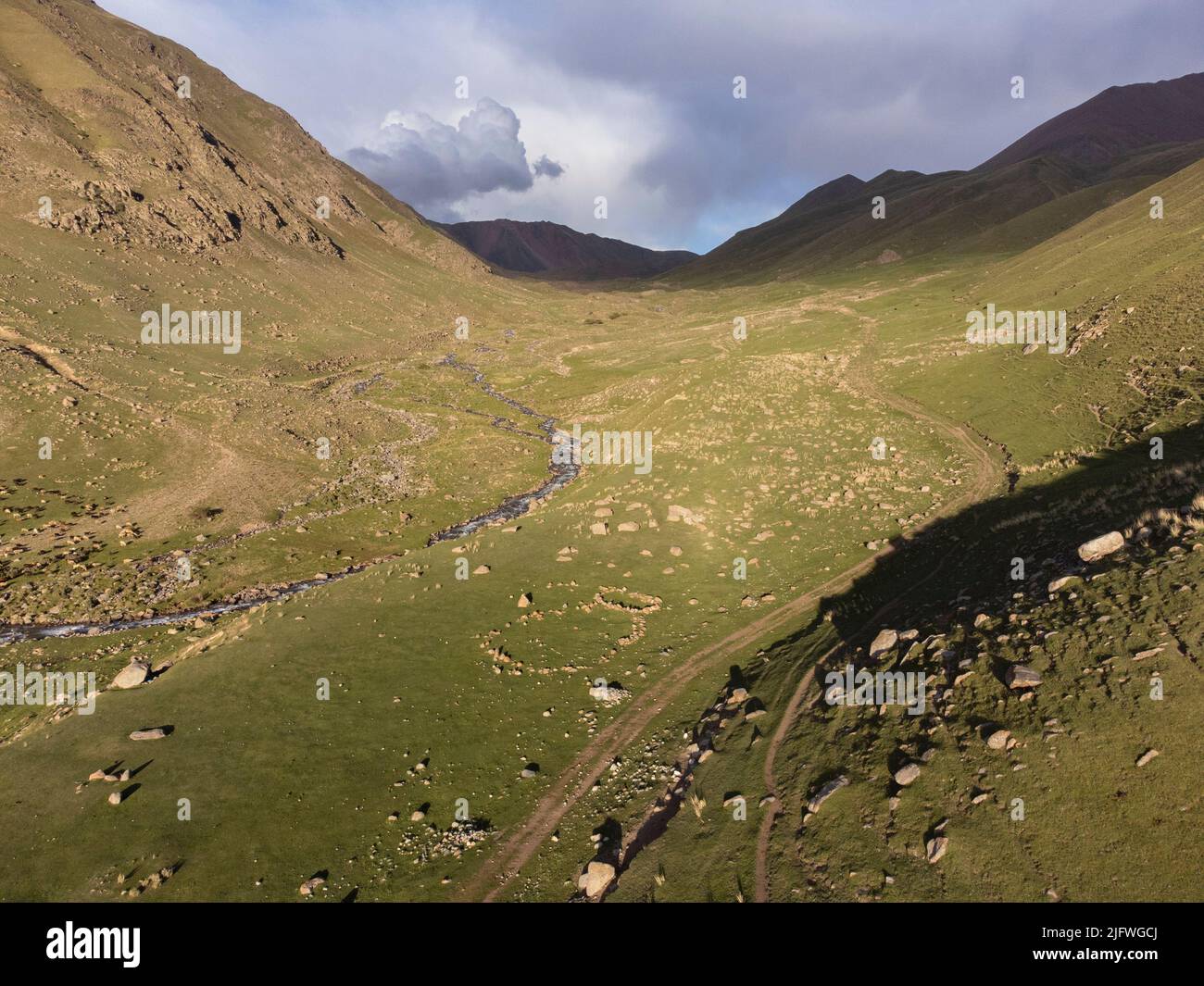 Low aerial view of a beautiful valley in the Tian Shan Mountains of ...