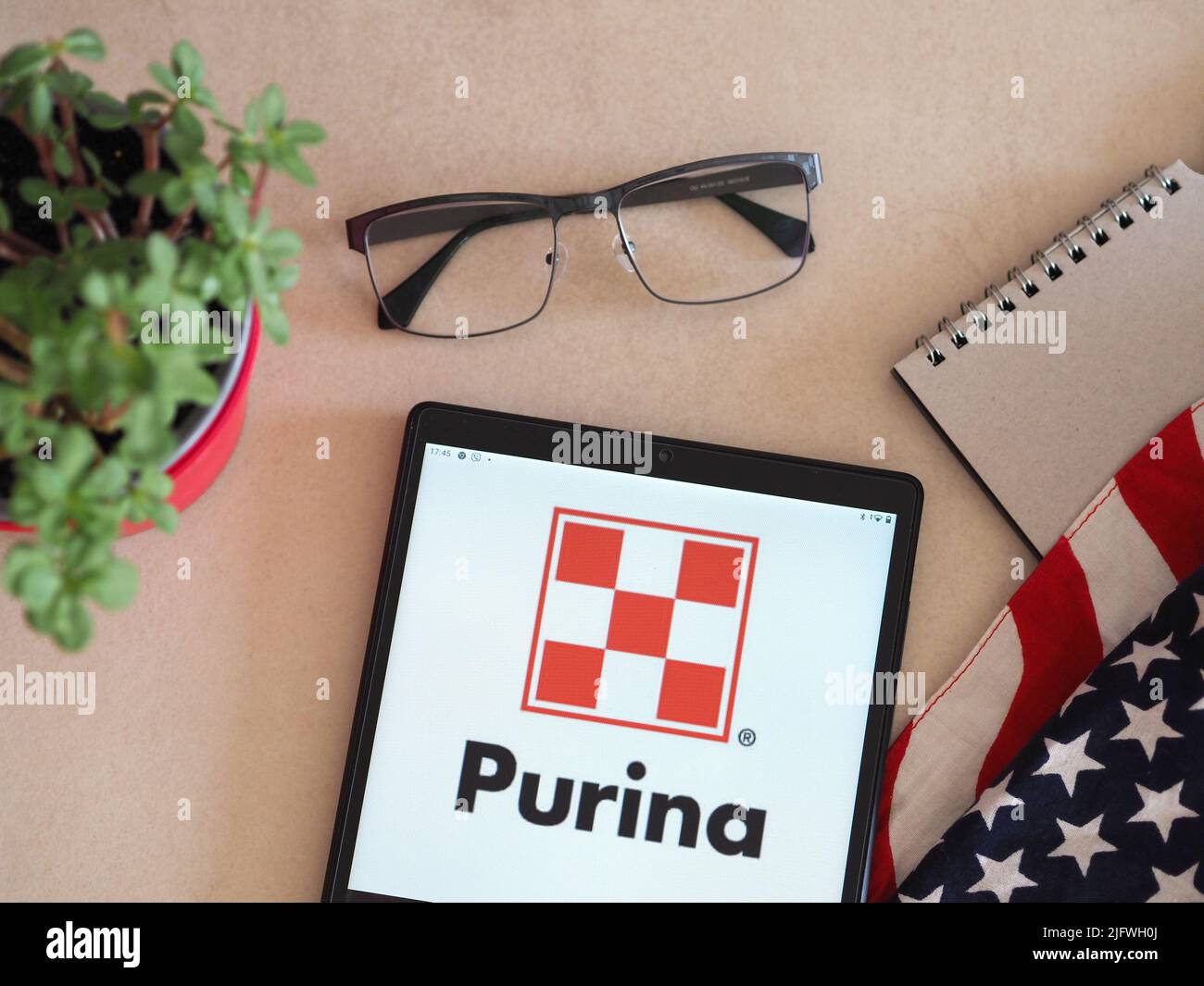 In this photo illustration Nestle Purina Petcare, or simply Purina logo ...