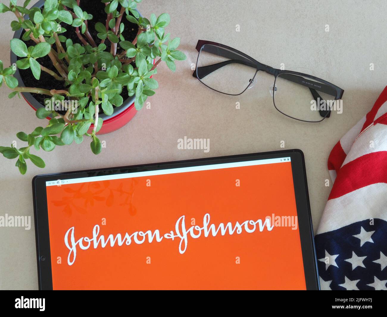 In this photo illustration Johnson & Johnson logo seen displayed on a ...
