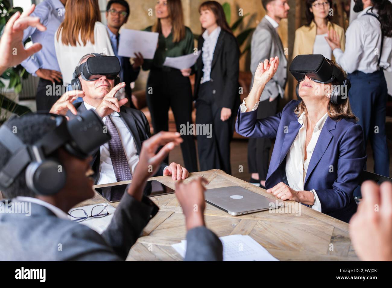 managers of a company using virtual reality to improve performance ...