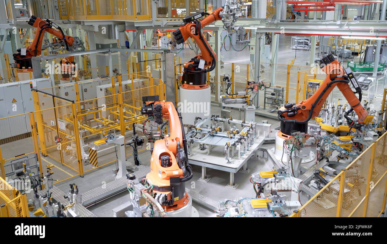 Russia, Moscow - May 7, 2022: Automated plant with robotics and workers ...