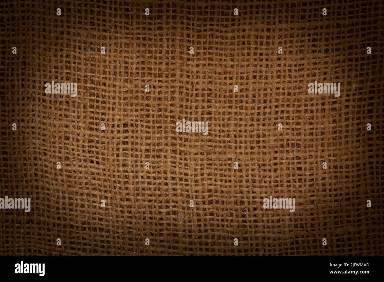 close up of dark brown sacking texture with darker border Stock Photo ...