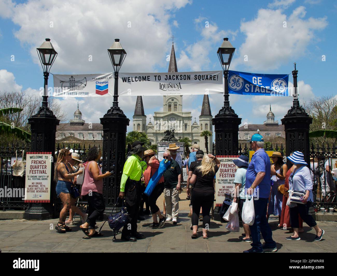 A crowd by the entrance to Jackson Square during French Quarter Fest ...