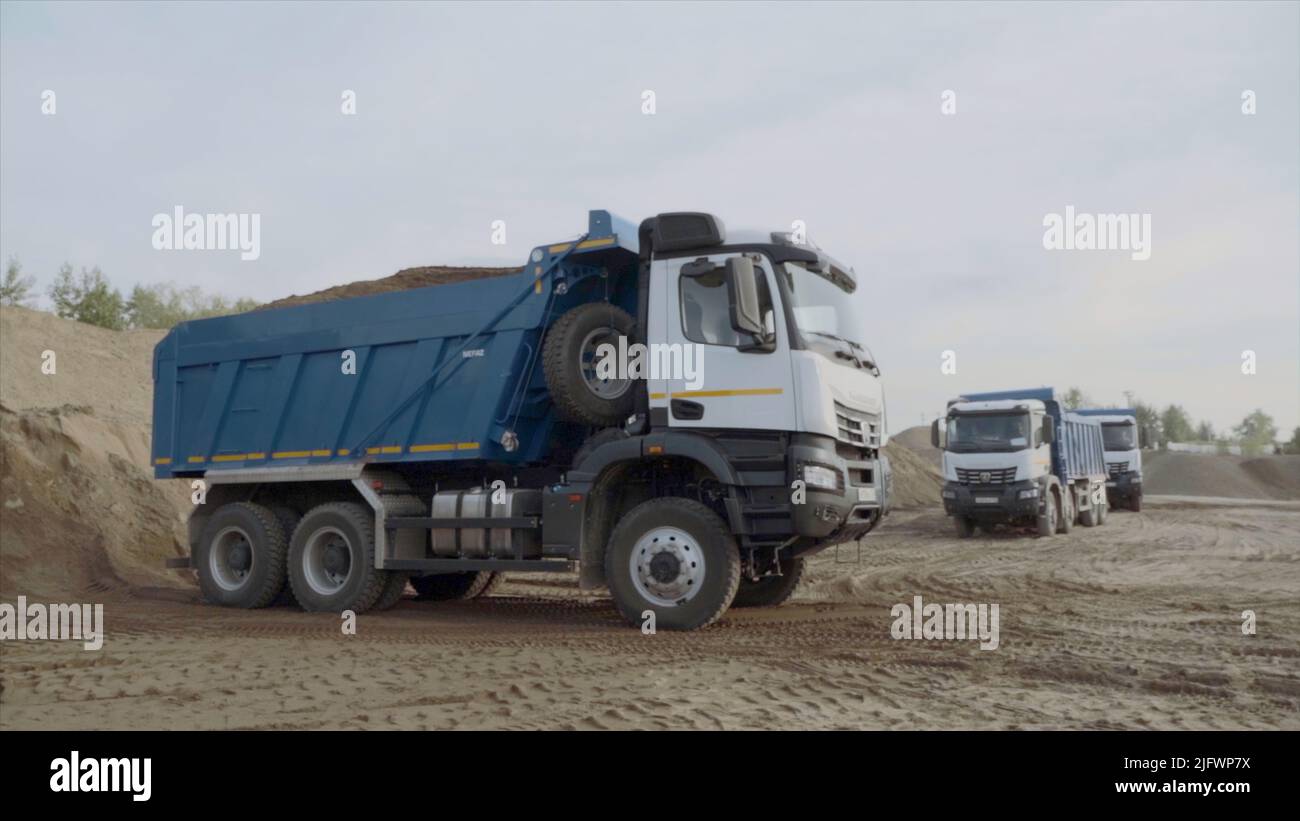 Russia, Moscow - May 7, 2022: Trucks on construction site or quarry ...