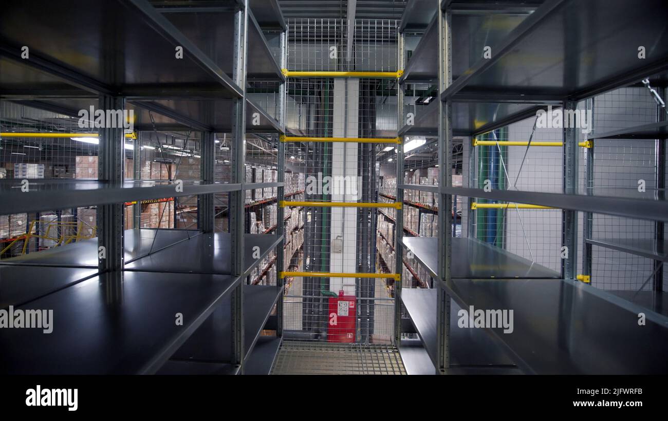 Storage.Creative.A man who arranges boxes and uses special vehicles for ...
