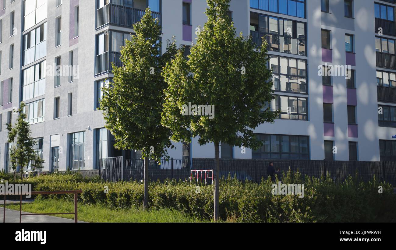 Beautiful green area of residential complex. Stock footage. Playground ...