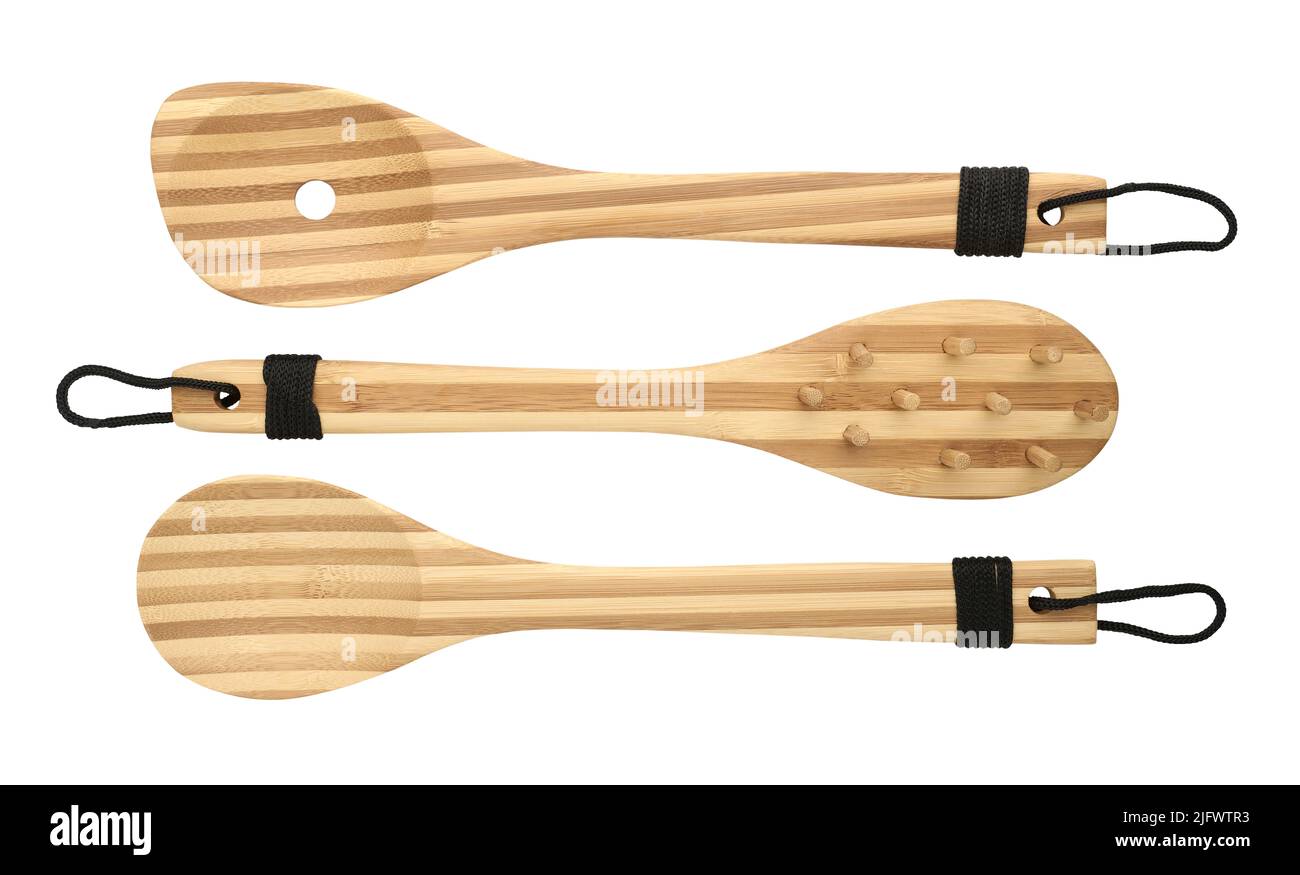 Set of three different bamboo spoons isolated on white background ...