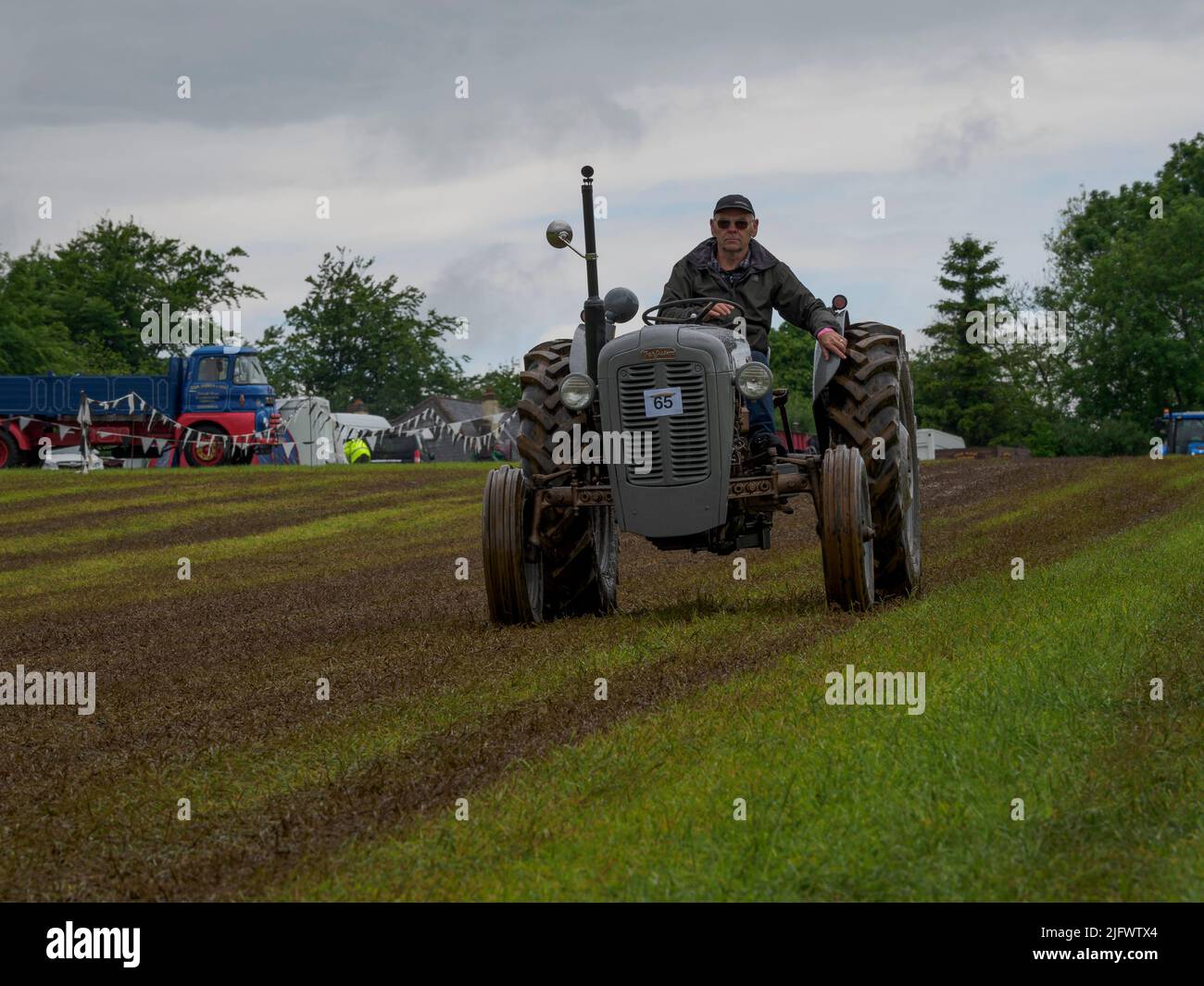 Man driving vintage tractor at the Launceston Steam & Vintage Rally ...