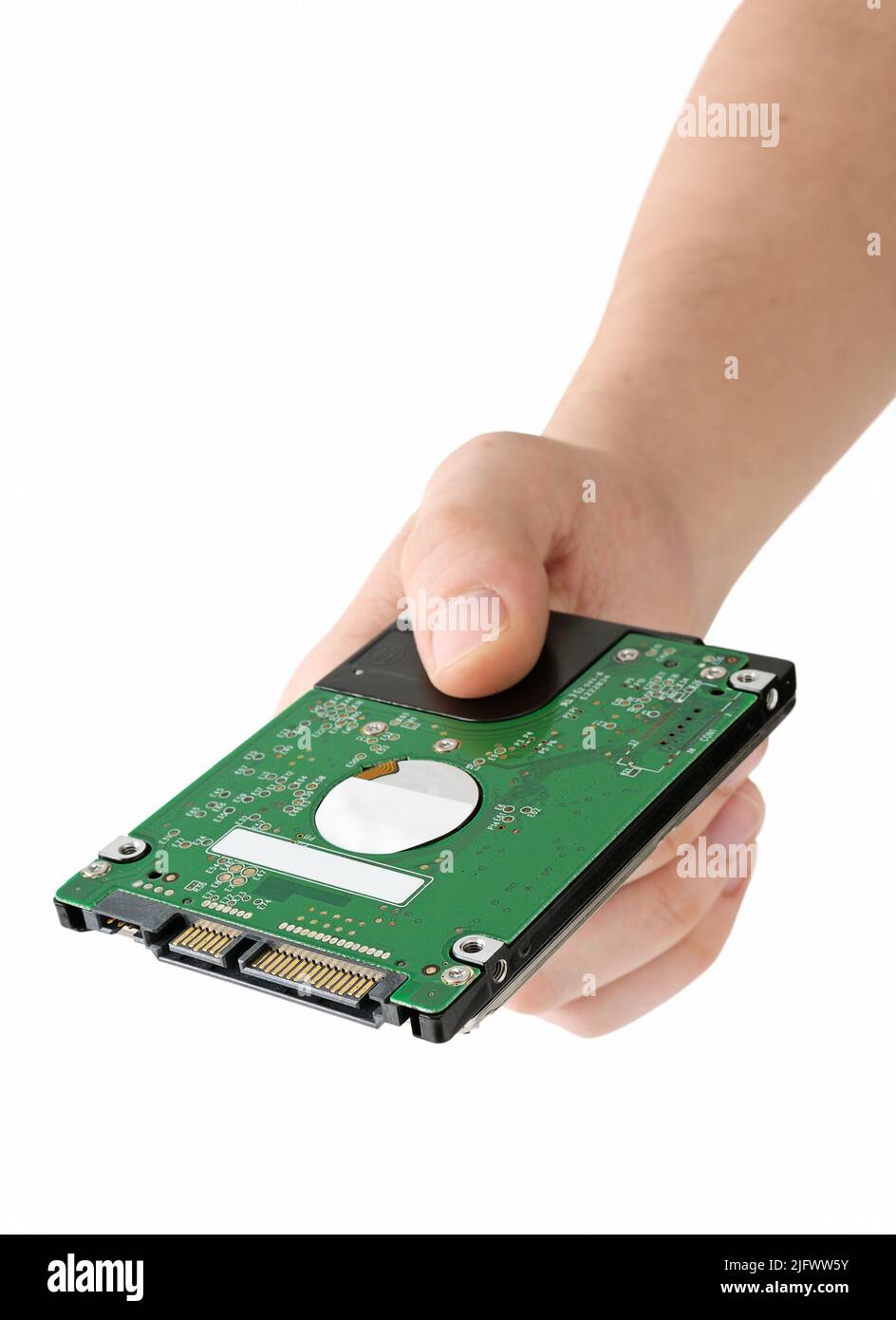 hard disk in hand isolated on a white background Stock Photo - Alamy