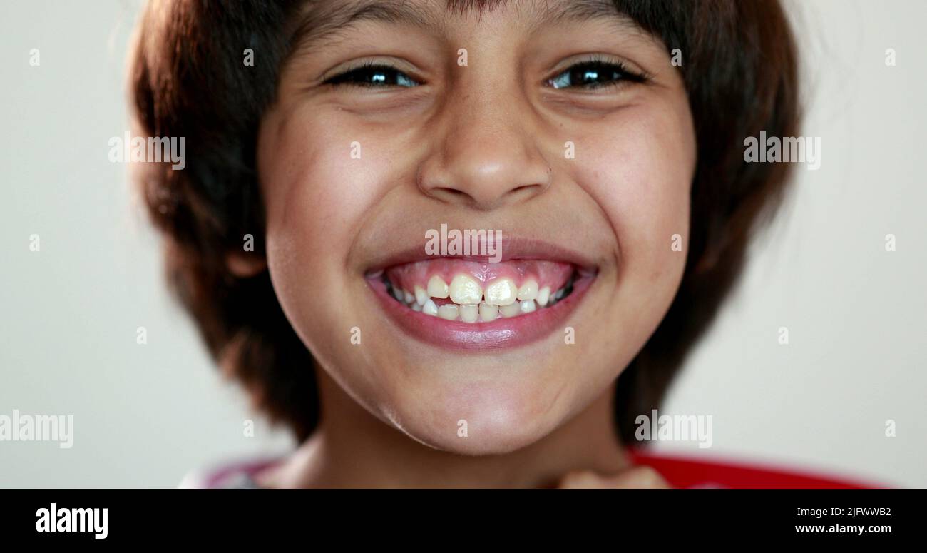 Handsome child portrait smiling. Mixed race ethnically diverse young ...