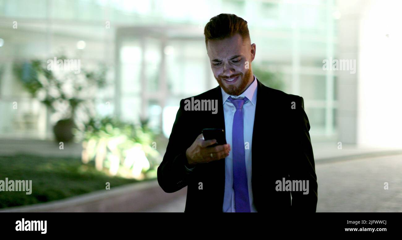 Handsome executive business man leaving office, man finishing work ...