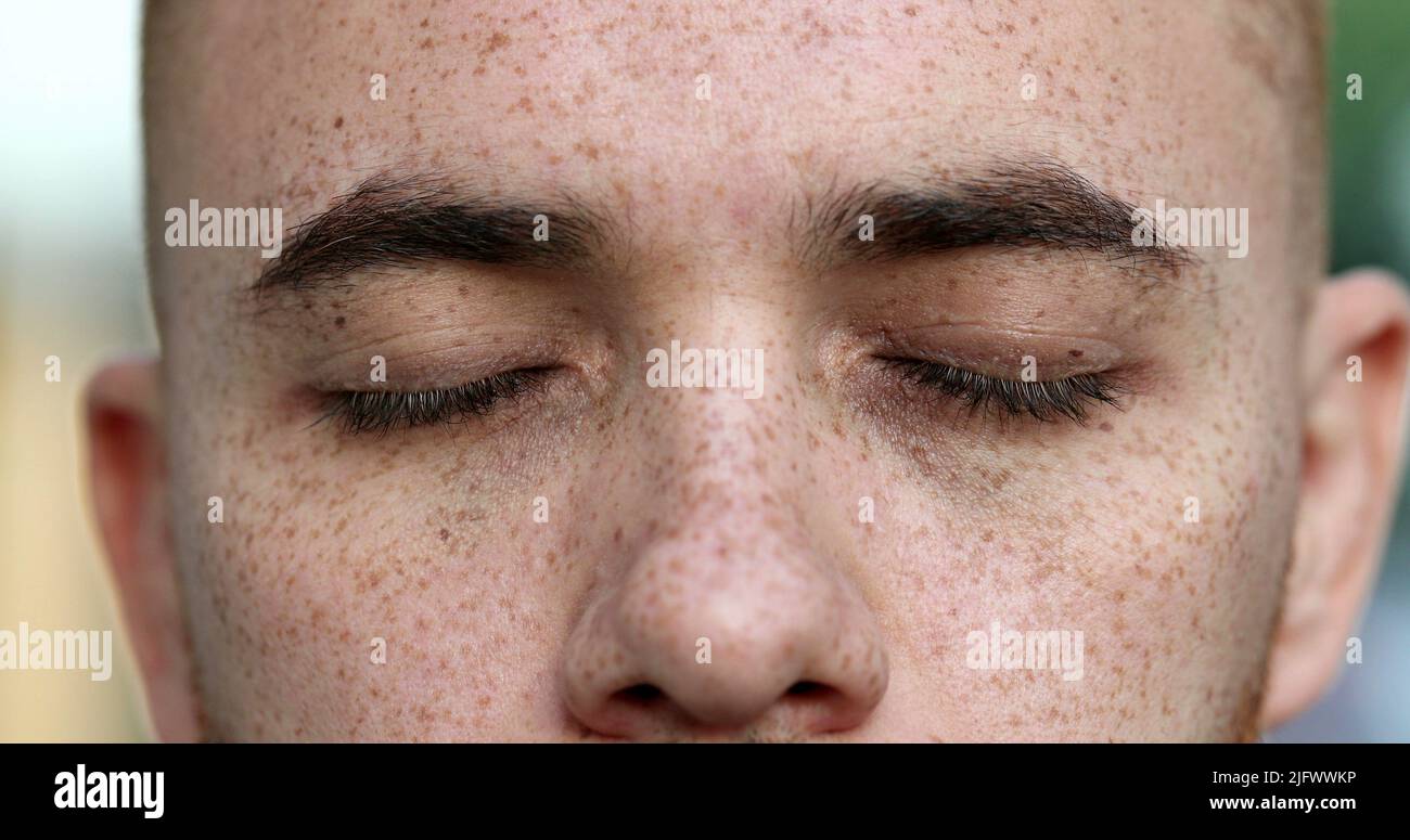 Irish looking man eyes closed meditating outside Stock Photo - Alamy