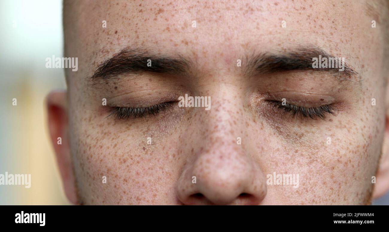 Irish looking man eyes closed meditating outside Stock Photo - Alamy