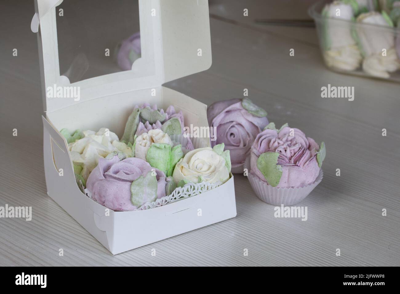 Homemade marshmallows packed in a gift box. Zephyr made in the form of ...