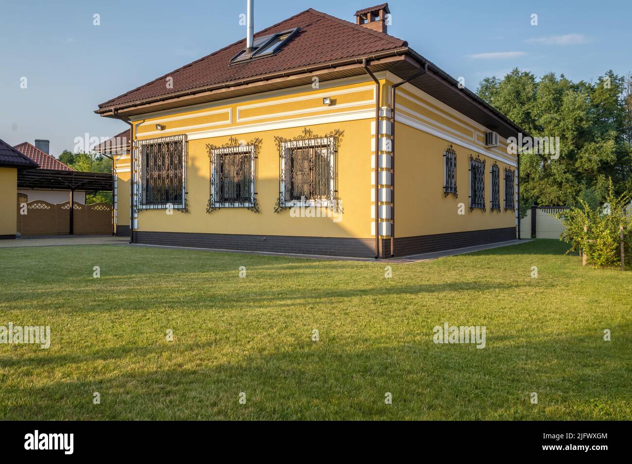 two-story concrete or brick country house Stock Photo - Alamy