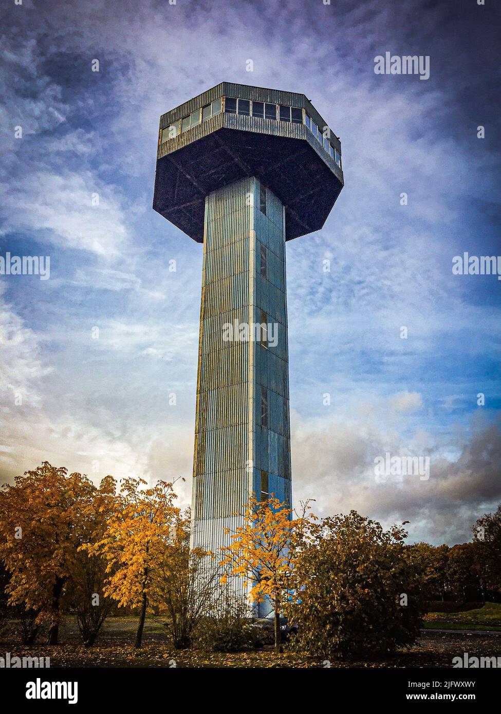 A vertical low angle closeup of the medieval fortified tower of ...