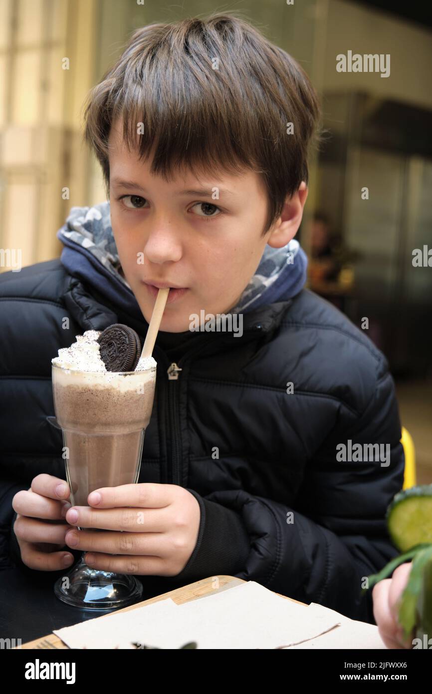 a boy with a milkshake Stock Photo - Alamy