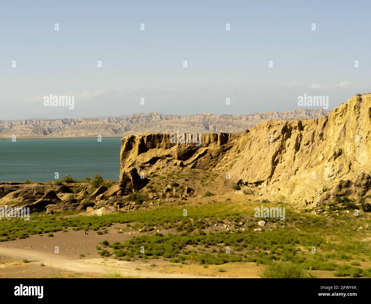 A beautiful view of rocky cliff on the shore Stock Photo - Alamy