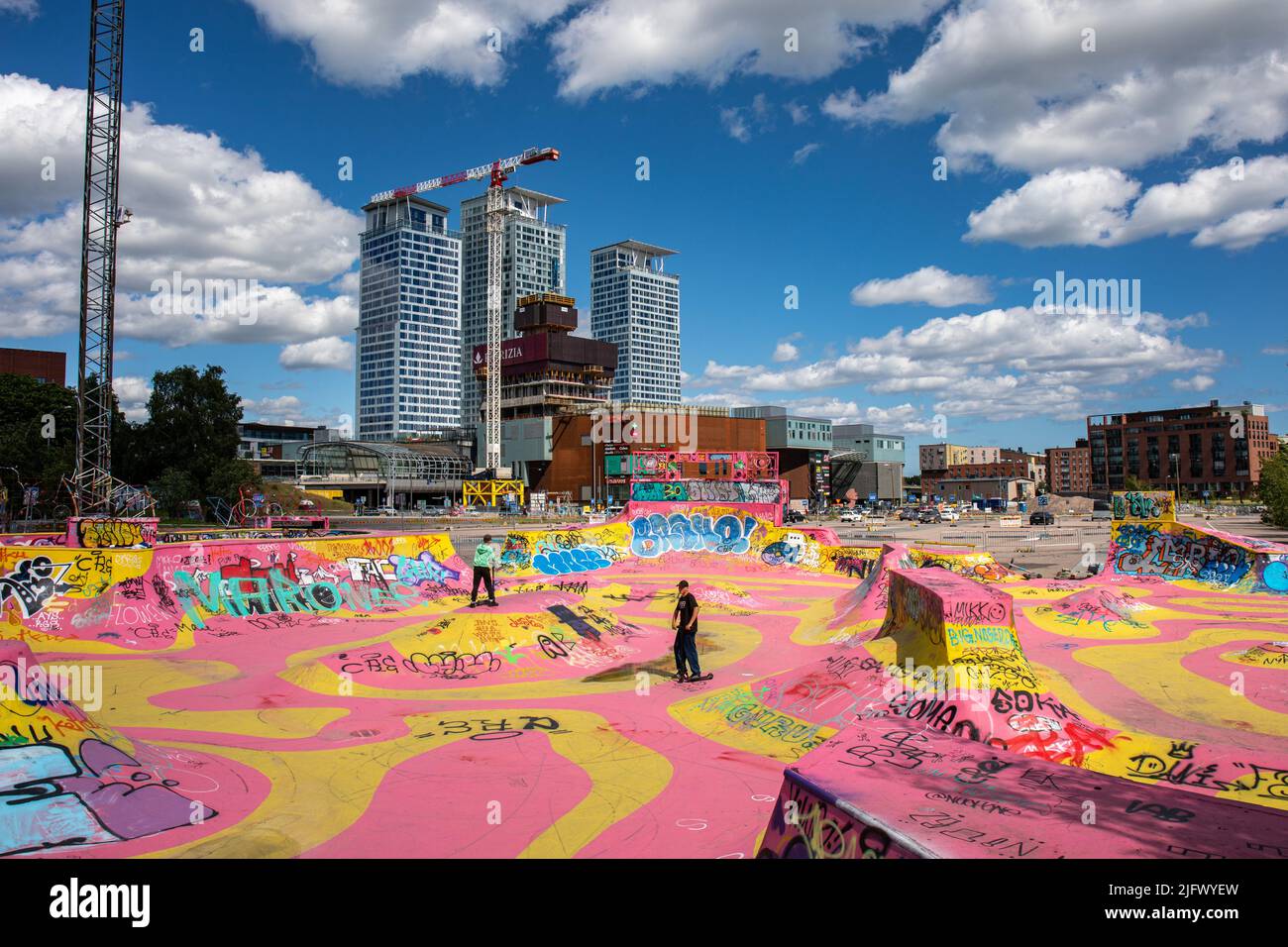 Pink and yellow Suvilahti DIY Skatepark with Redi mall and Kalasatama ...