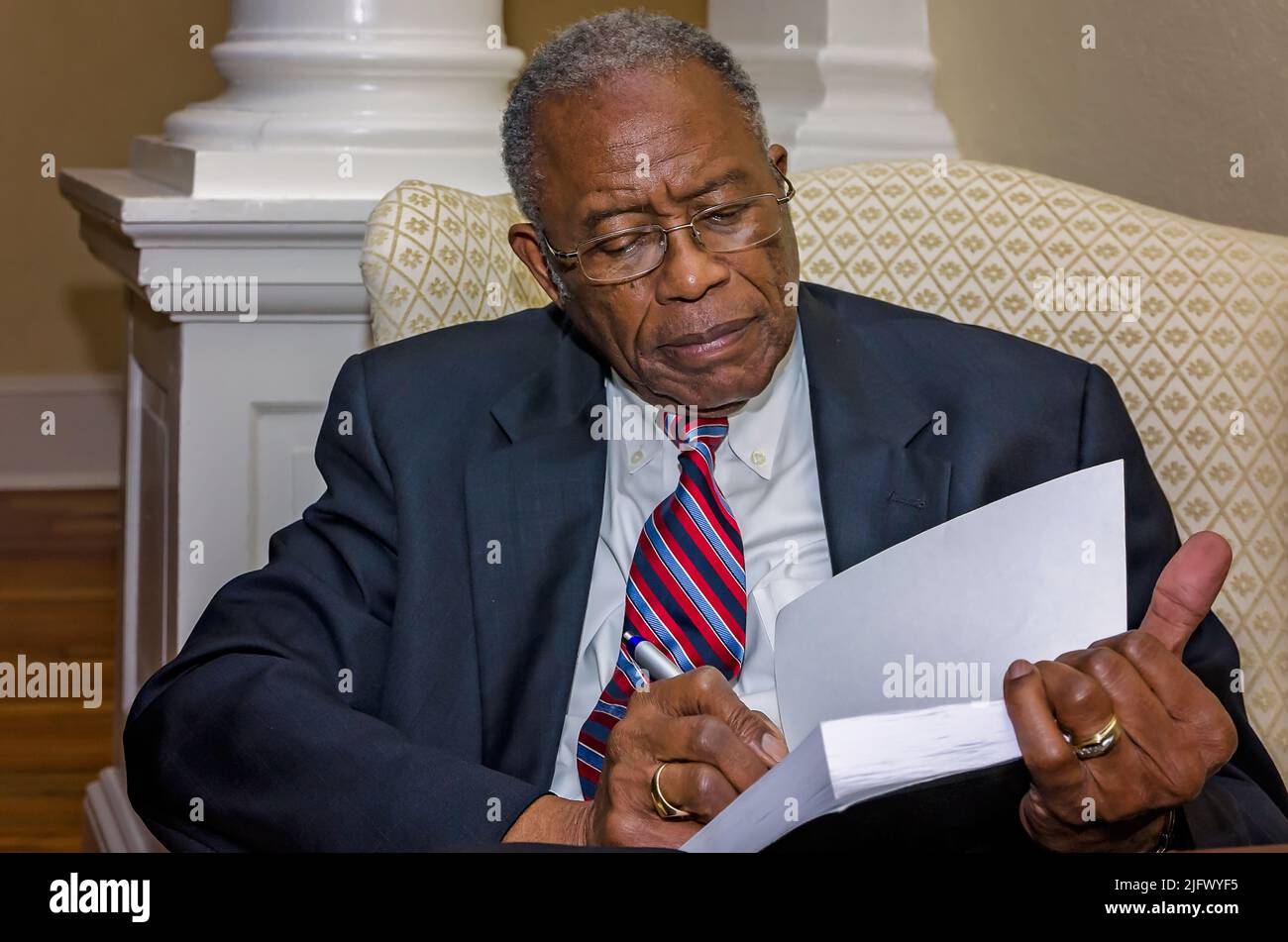 Civil Rights attorney Fred Gray signs a copy of his autobiography, “Bus ...
