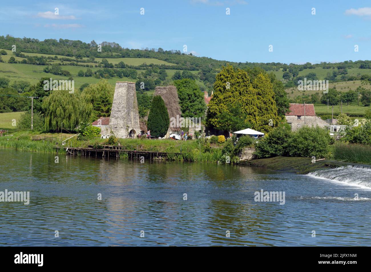 Kelston Brass Mill and Saltford Weir on the river Avon at Saltford near ...
