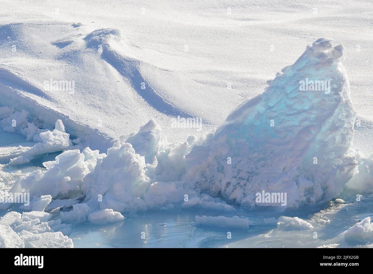 Arctic Ice. The sun shines through a piece of ice on the Arctic Ocean ...
