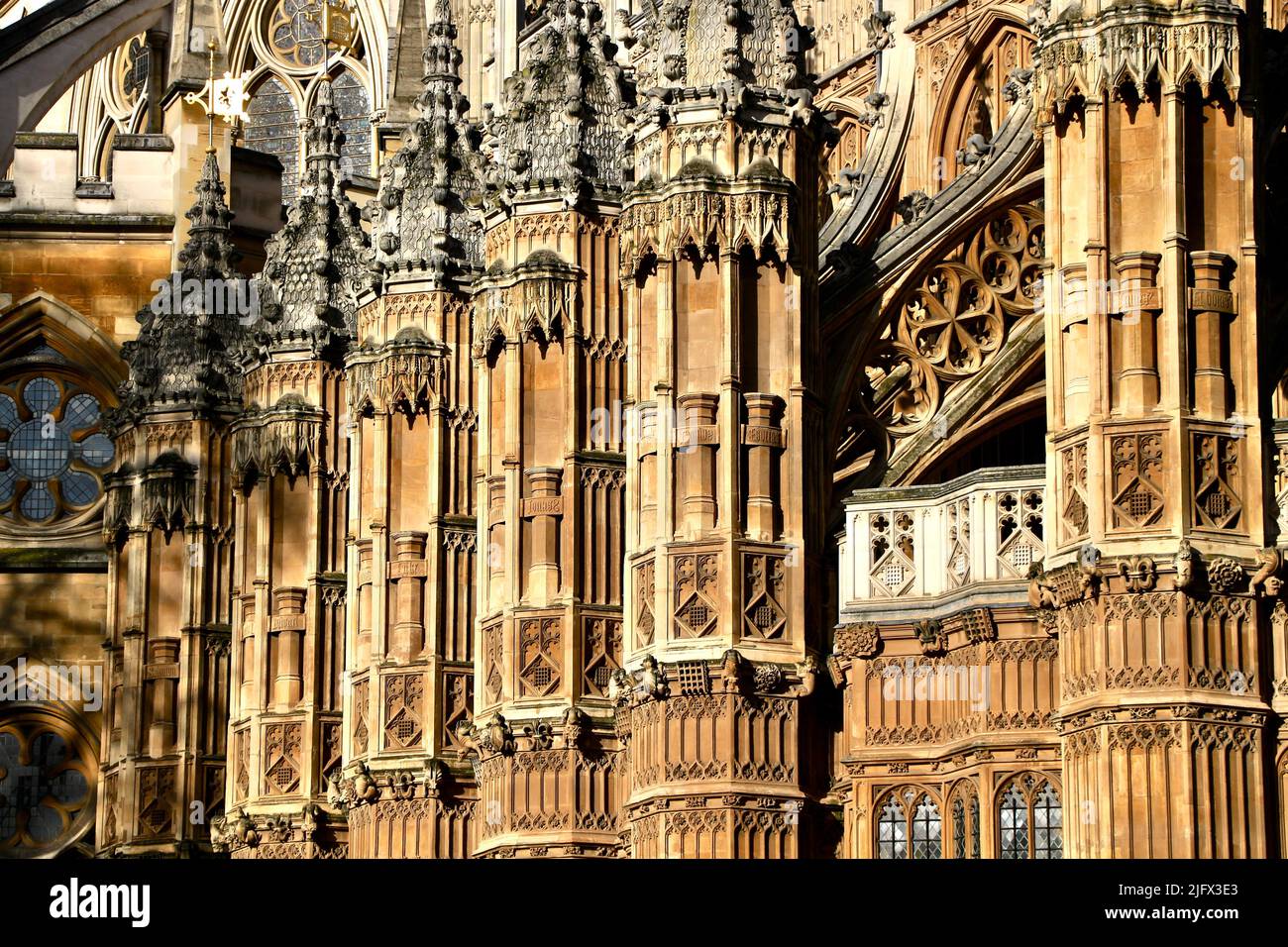 A fragment of a beautiful cathedral facade with columns, arches ...
