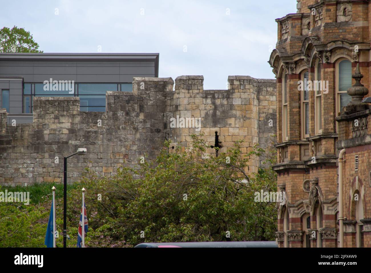 Cityscape view of a section of the Walls of York, fortified stone walls ...