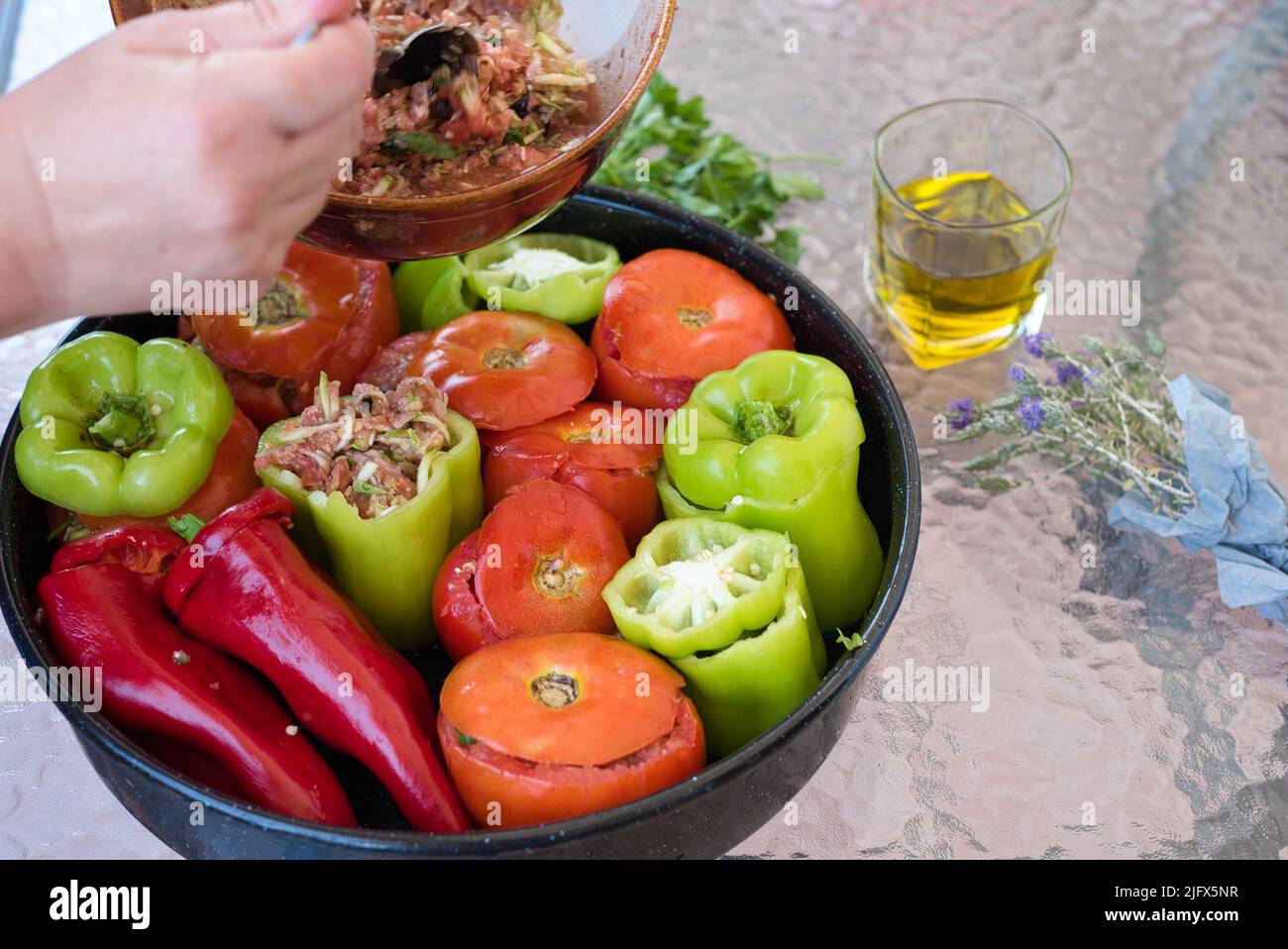 Greek traditional food Gemista already cooked in the oven. Stuffed ...