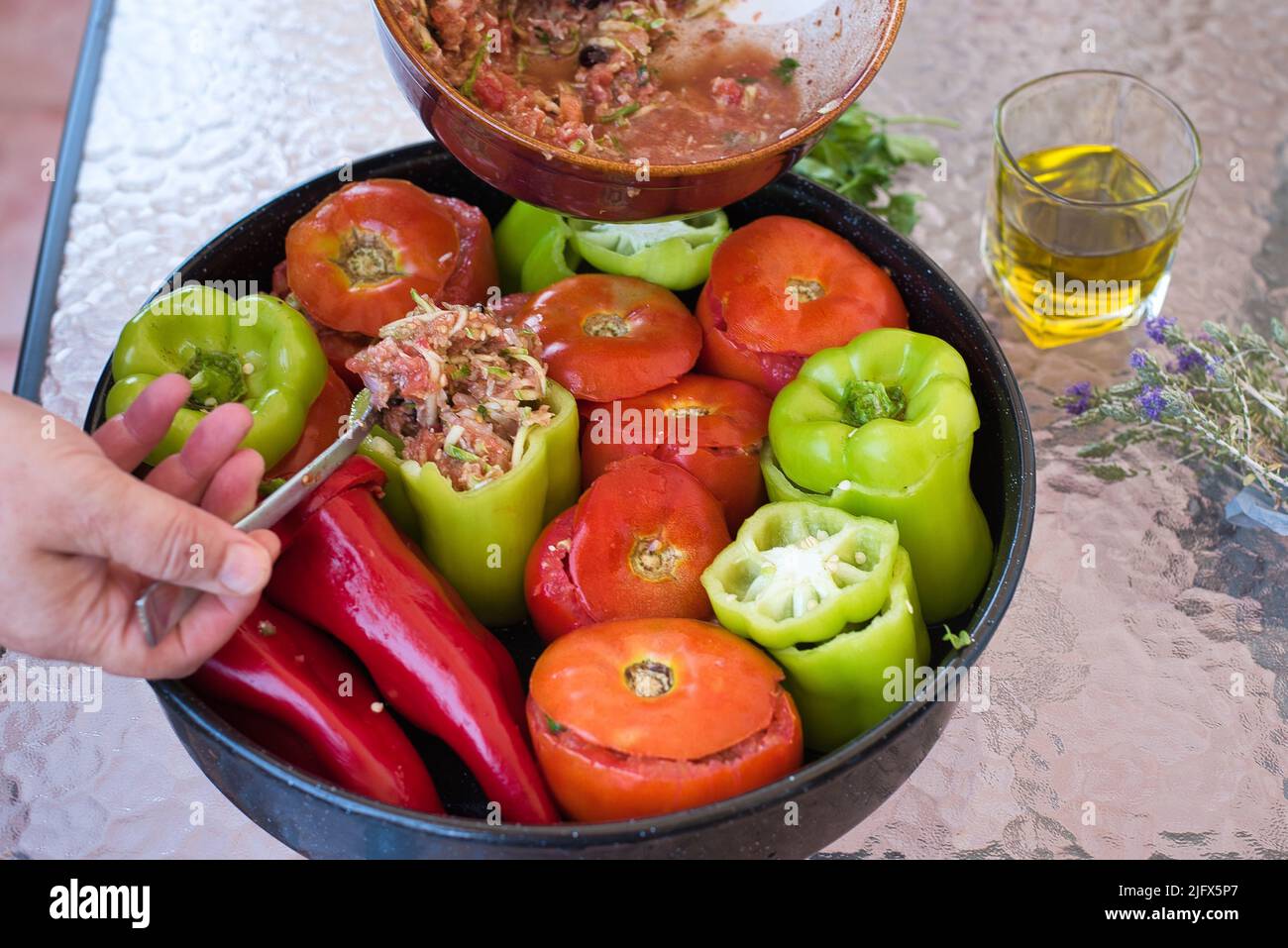 Greek traditional food Gemista already cooked in the oven. Stuffed ...