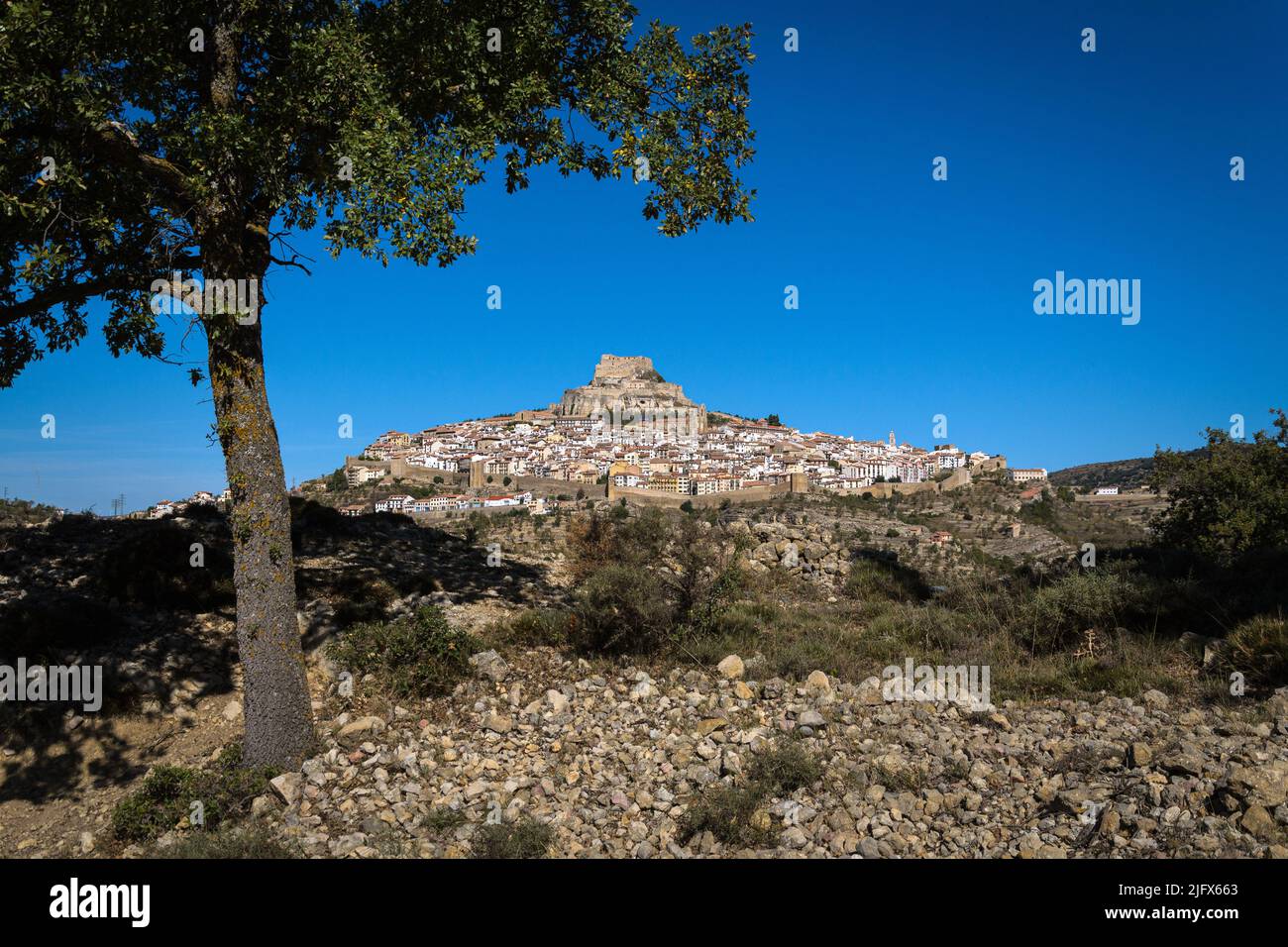 The medieval city of Morella with its walls and the castle on top of ...
