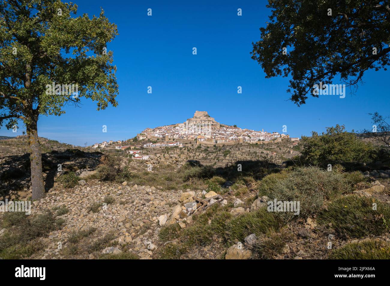 The medieval city of Morella with its walls and the castle on top of ...