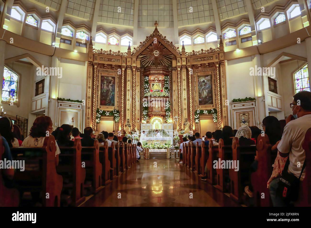 A view of the interior of Antipolo Cathedral during the Holy Mass. The ...
