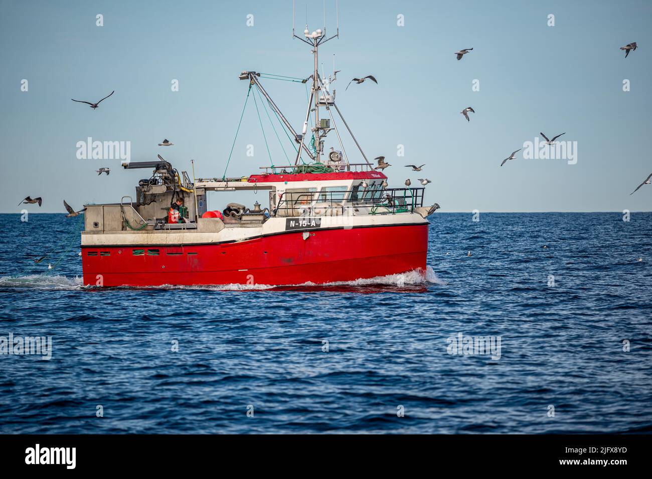 Red painted fishing boat, Andenes, Norway Stock Photo - Alamy