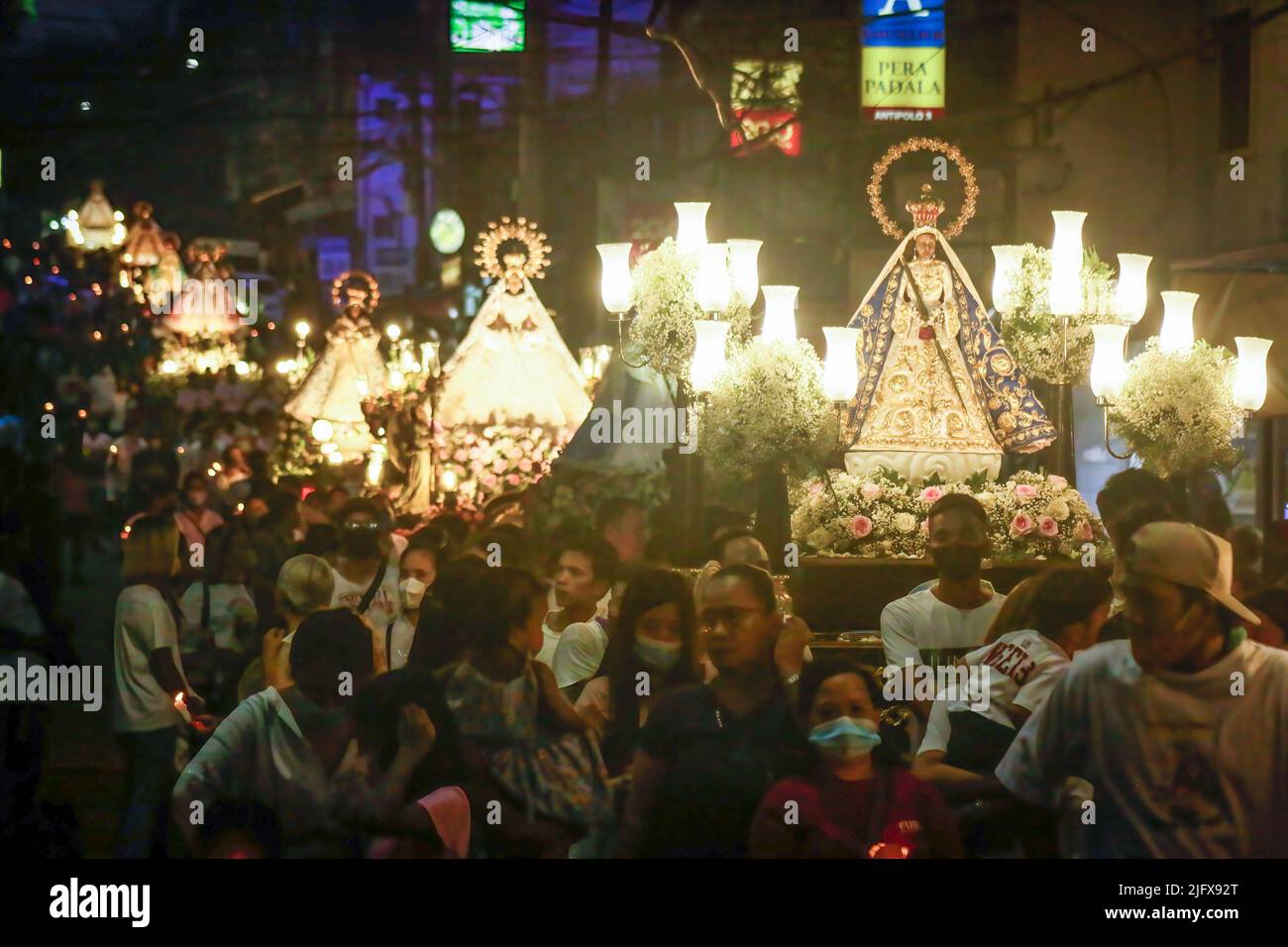 Marian devotees of Antipolo Cathedral join a solemn procession for the ...