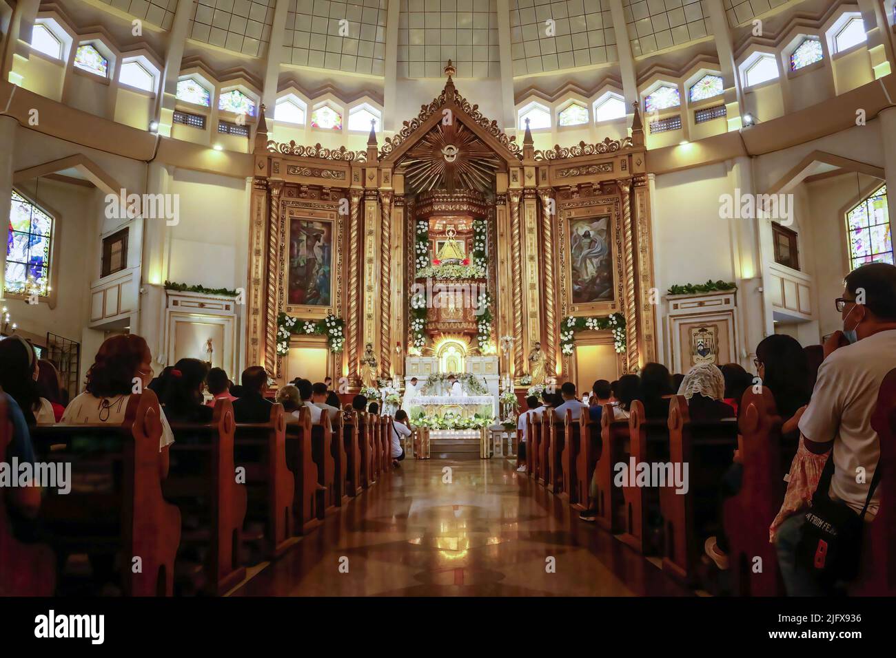 A view of the interior of Antipolo Cathedral during the Holy Mass. The ...