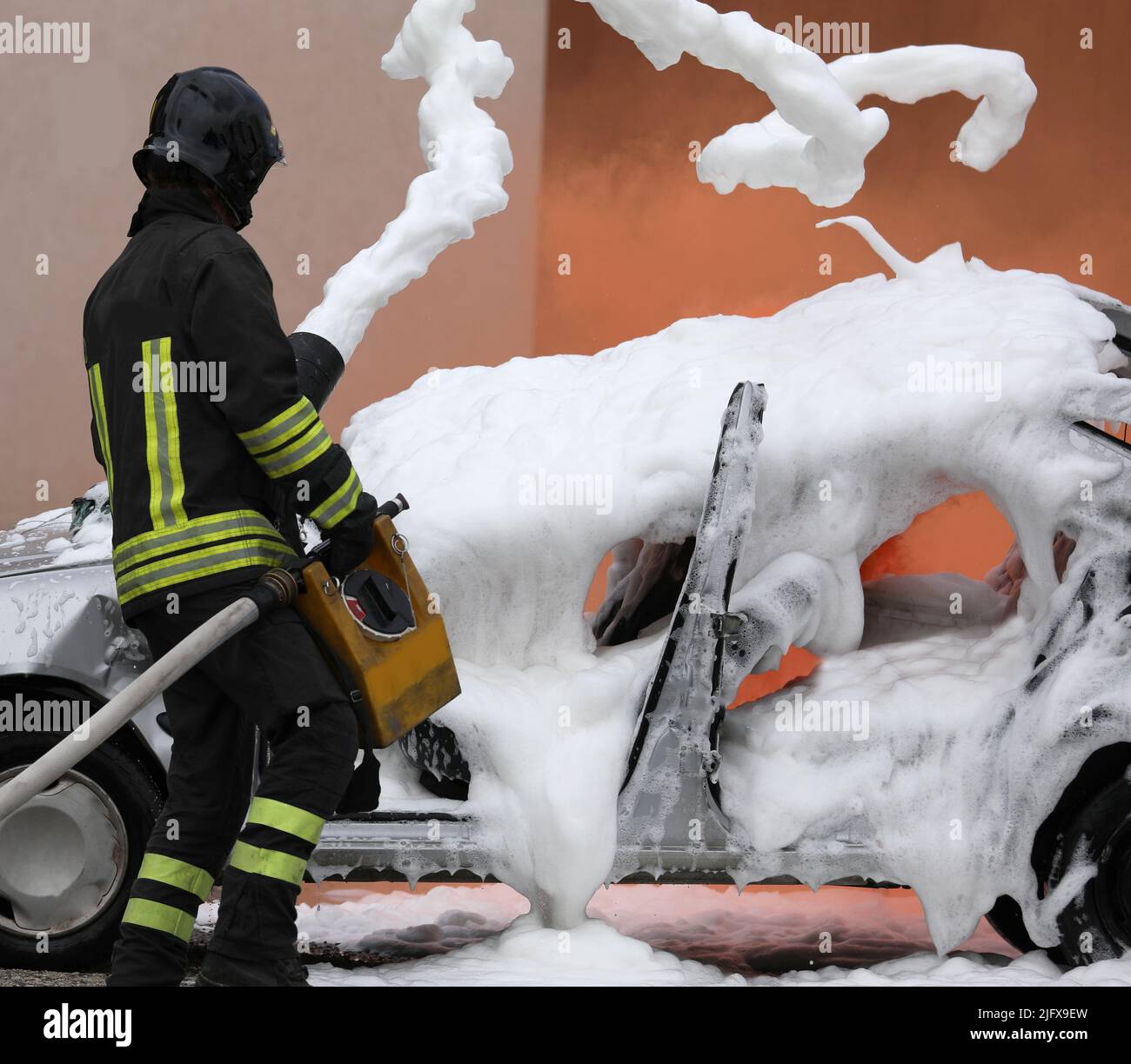 Throwing fire extinguisher hi-res stock photography and images - Alamy